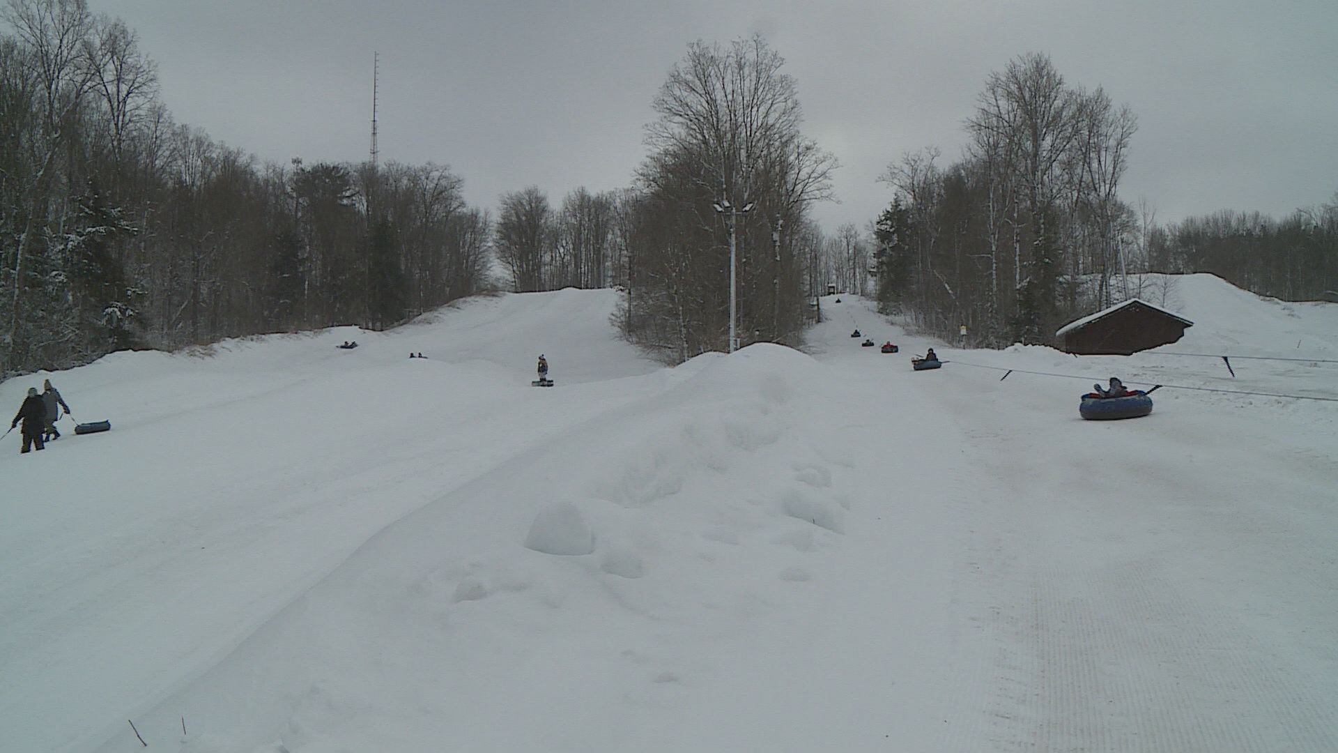 Tubers hit the slopes on Sylvan Hill to enjoy the fresh snow