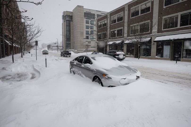 Bomb cyclone slams Midwest with blizzards as powerful winter storm ...