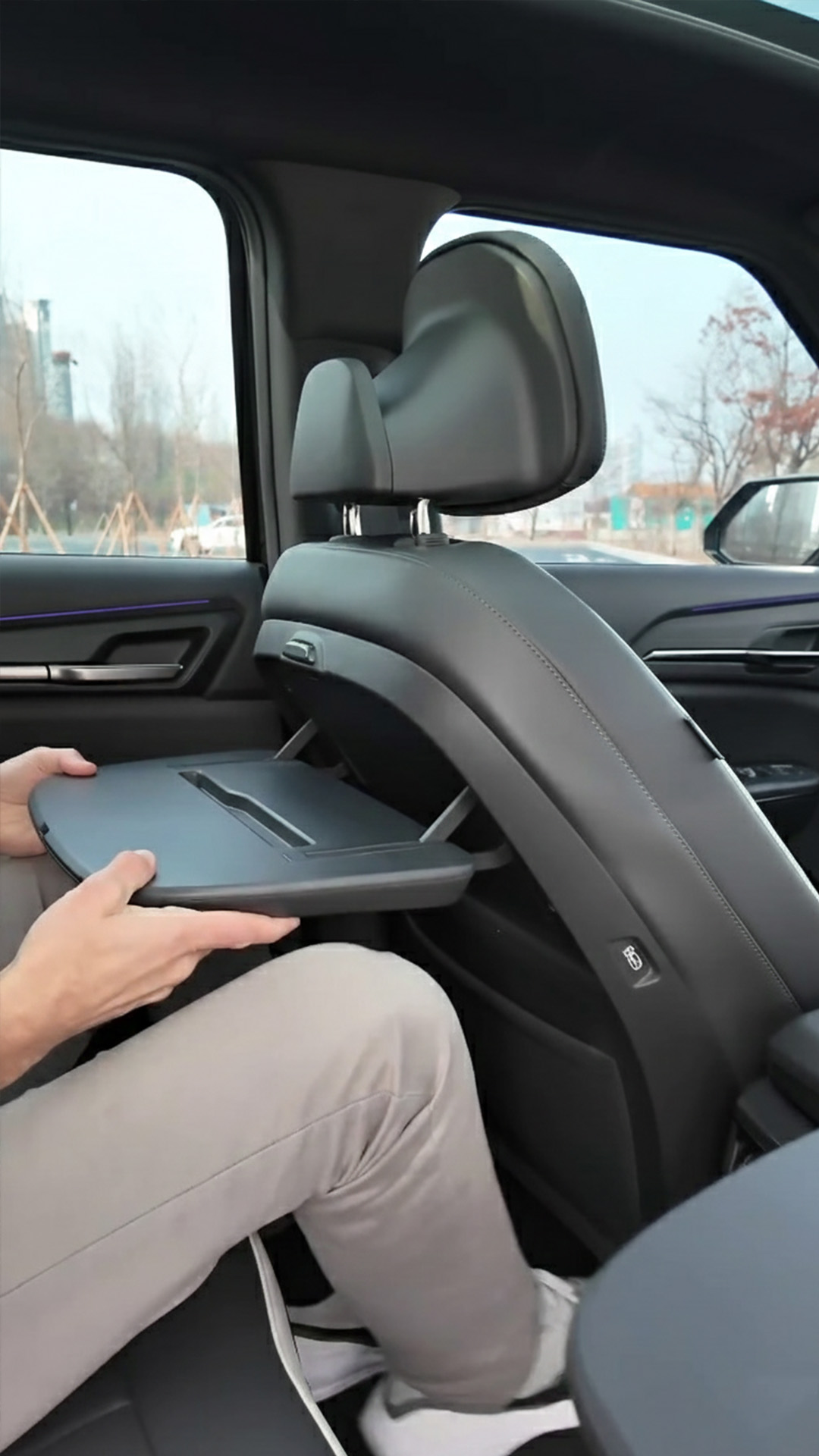 Clean rear seat table integration