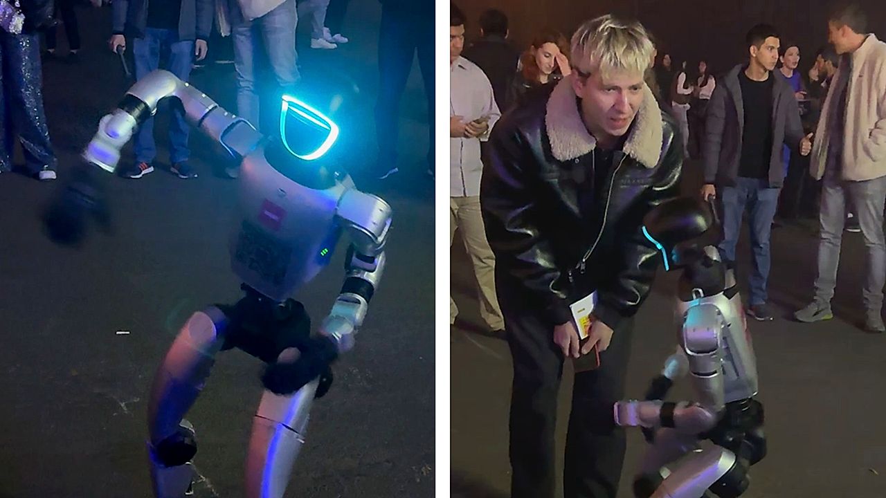 Dancing robot slaps man