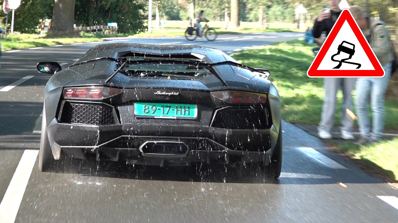 Lamborghini Aventador driving on a wet and slippery road
