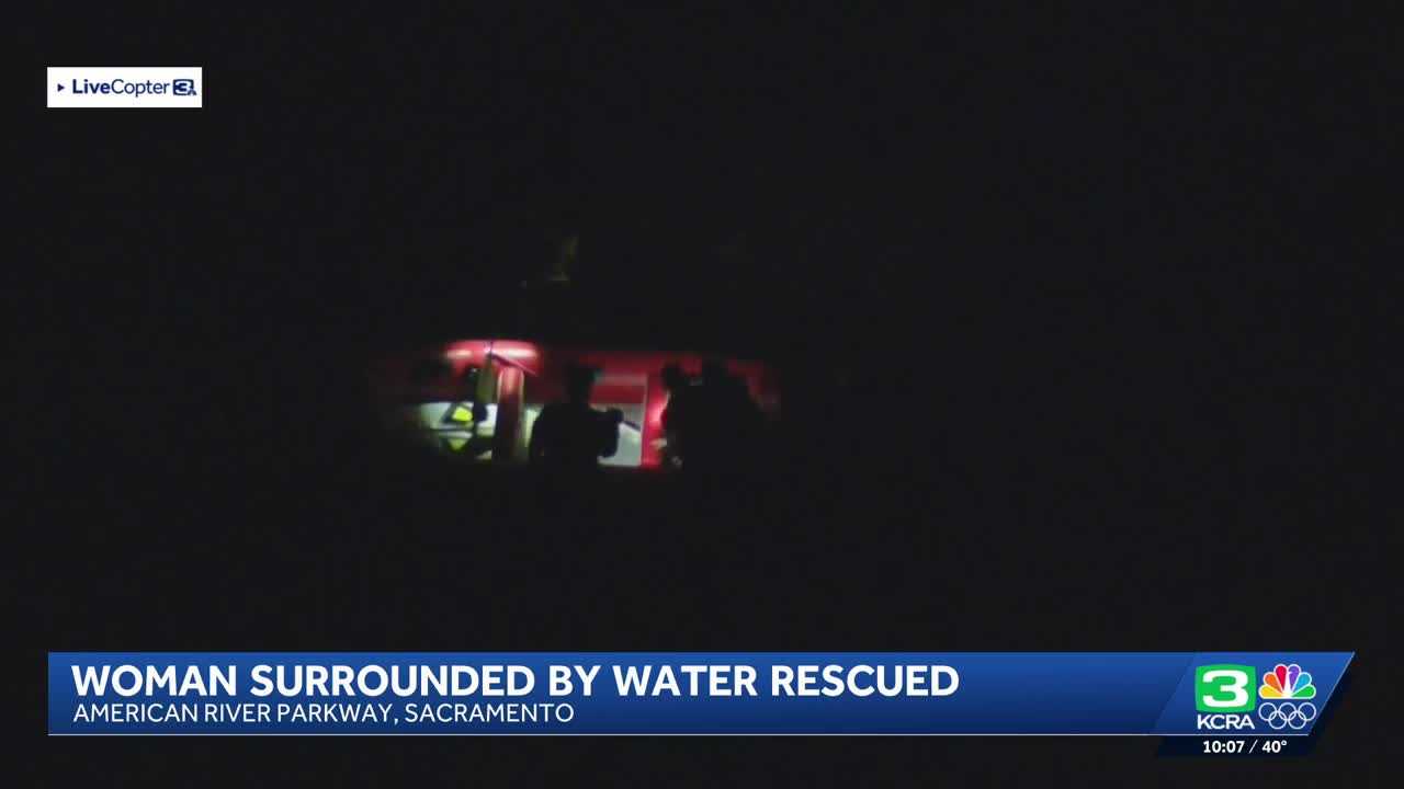 Woman surrounded by water rescued near Discovery Park; fire engine ...