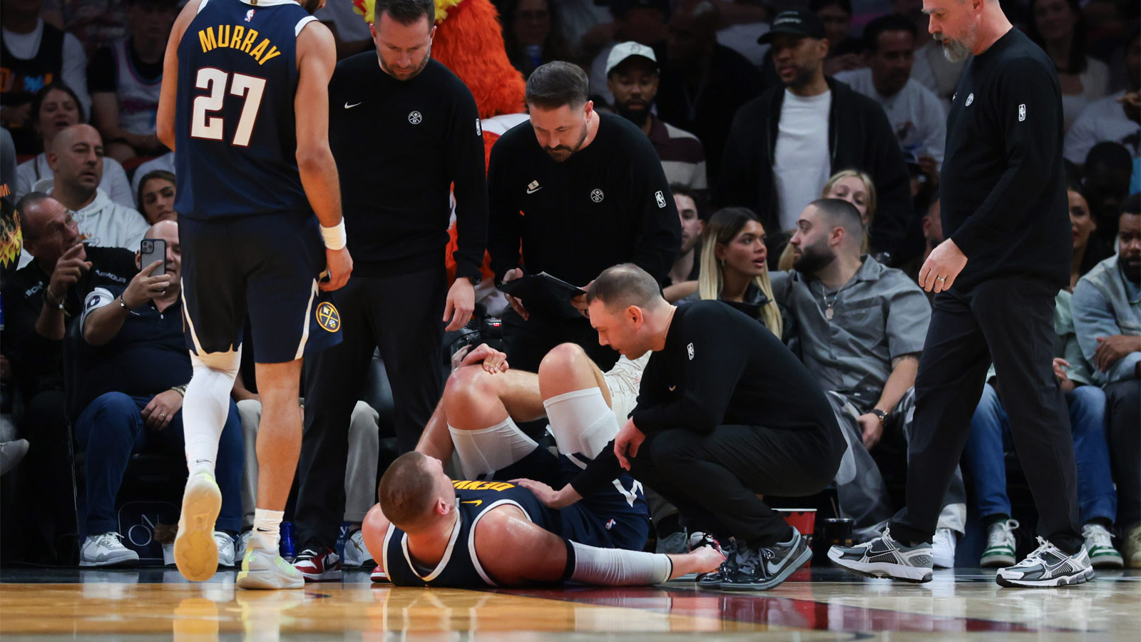 Nuggets’ David Adelman reacts to Nikola Jokic’s knee injury