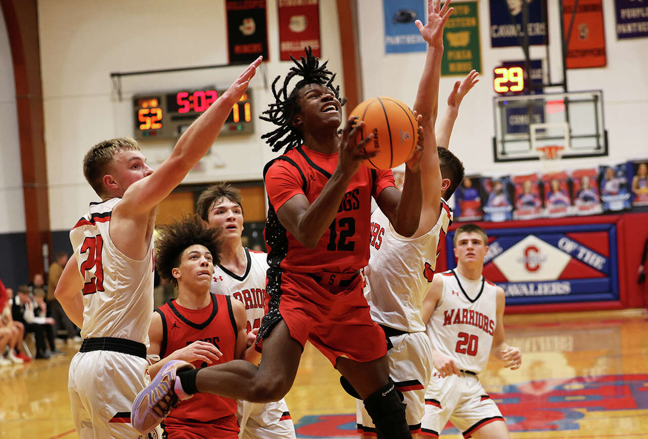 Monday's boys basketball holiday tournament scores and schedules