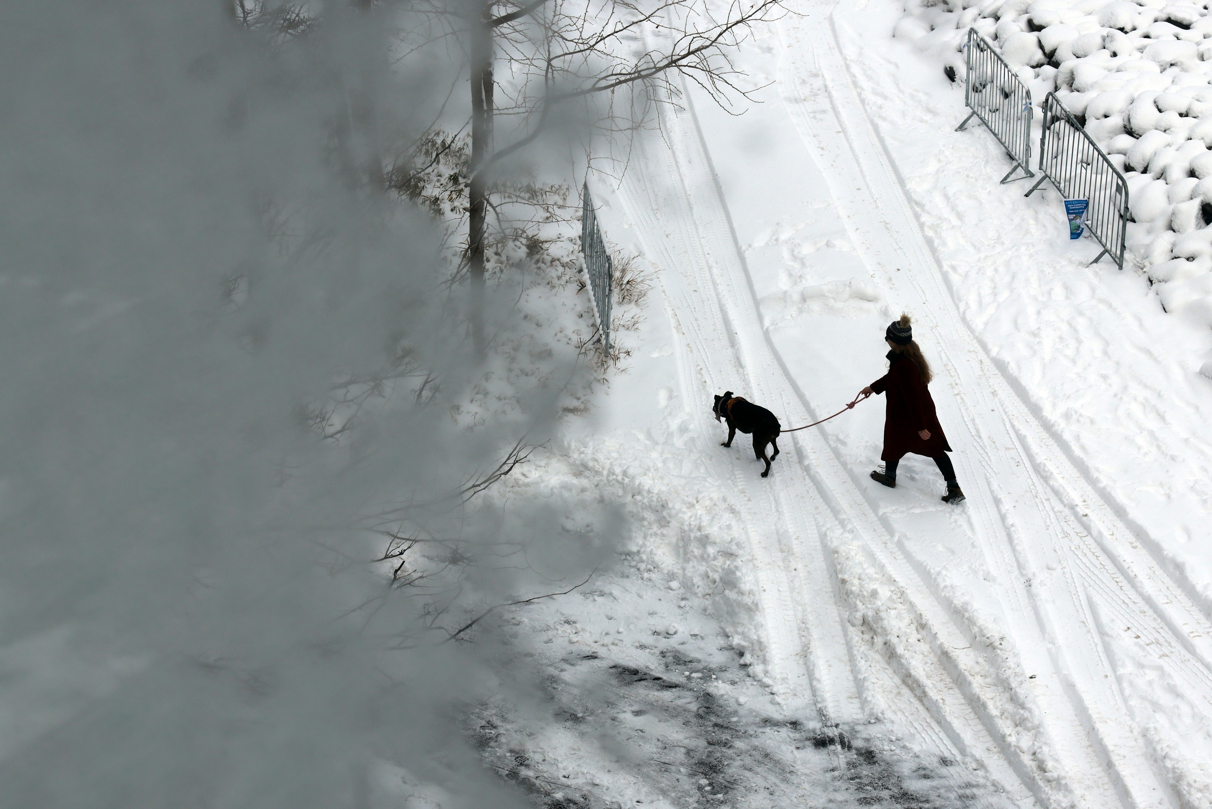 Dangerous bomb cyclone slams Midwest with blizzard and power outages