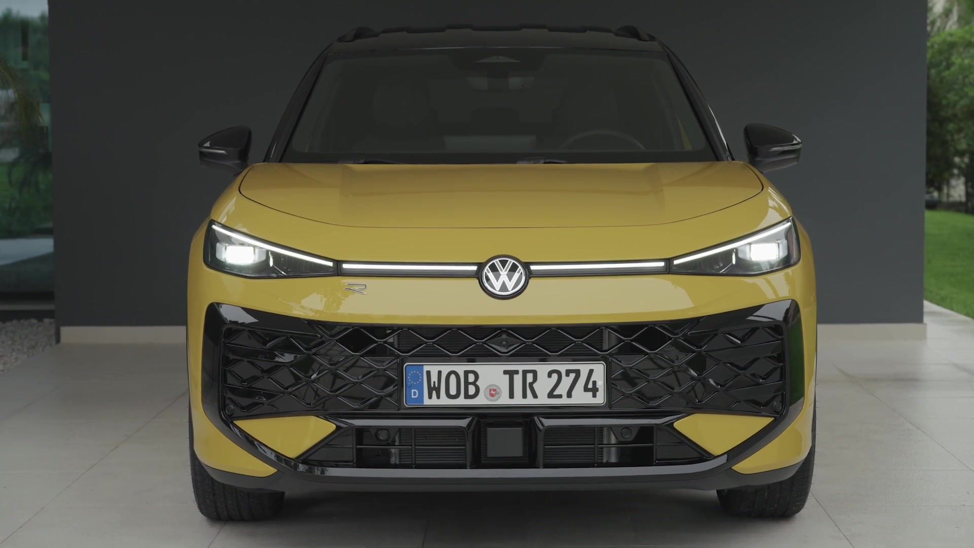 The new Volkswagen T-Roc design preview in Canary yellow