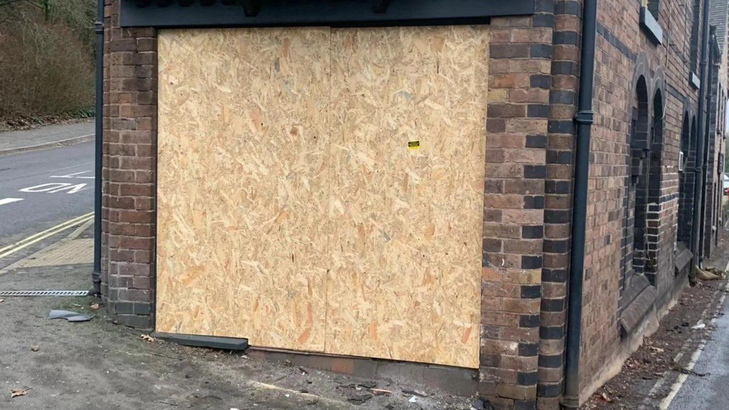 Charges after car smashes into chef's new bakery