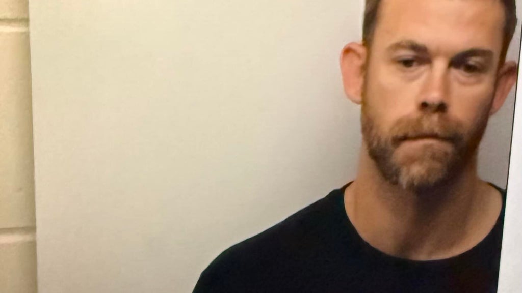 Georgia inmate who escaped police patrol car after spraying officer ...