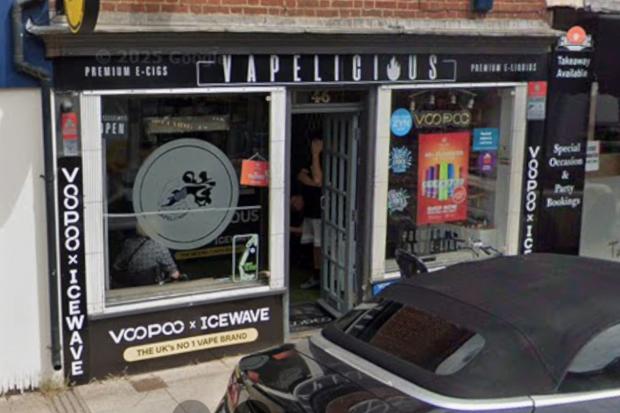 Three men smash shop front door window and steal vape pods