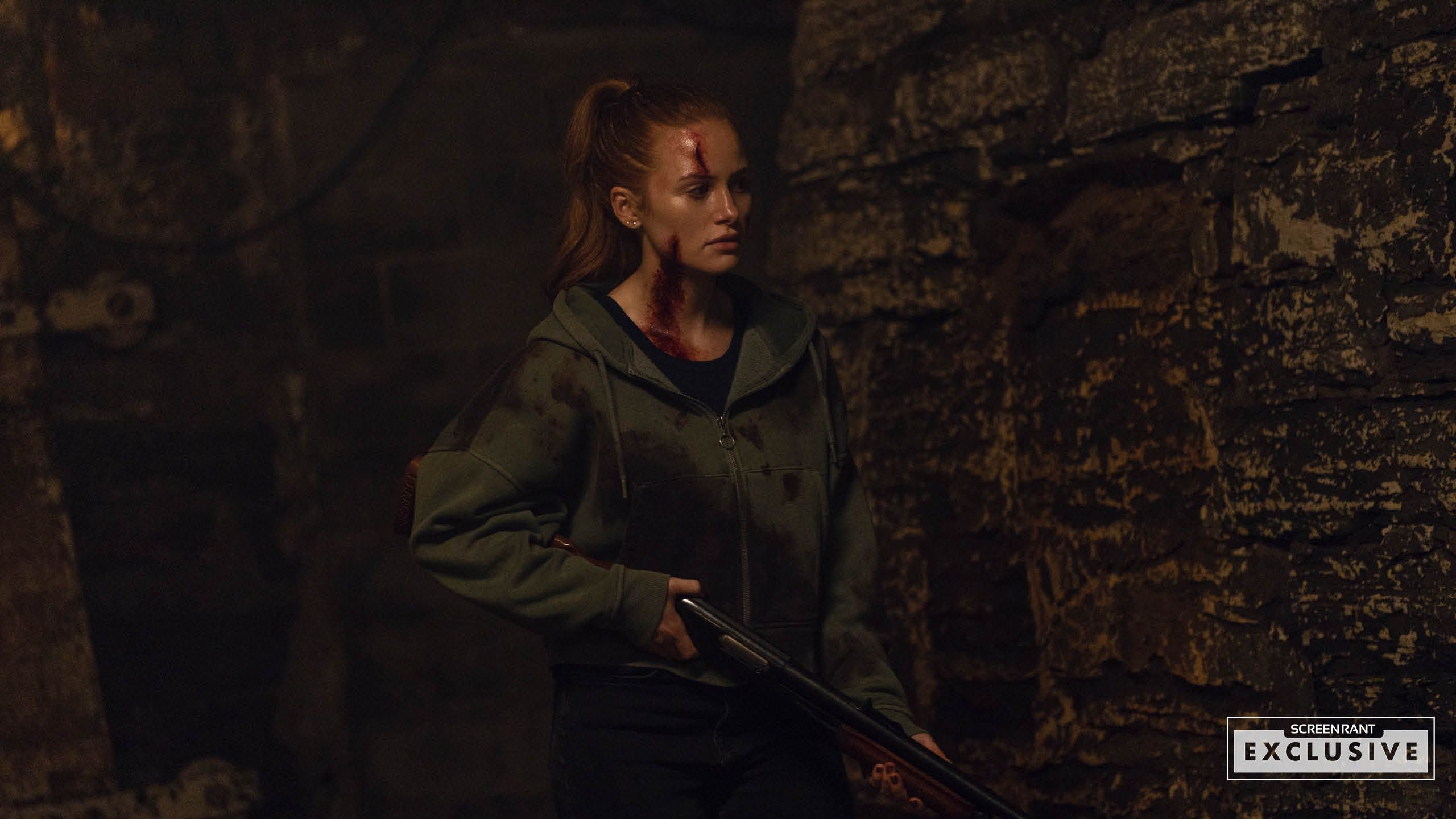 A bloodied Madelaine Petsch arms herself with a shotgun in new The ...
