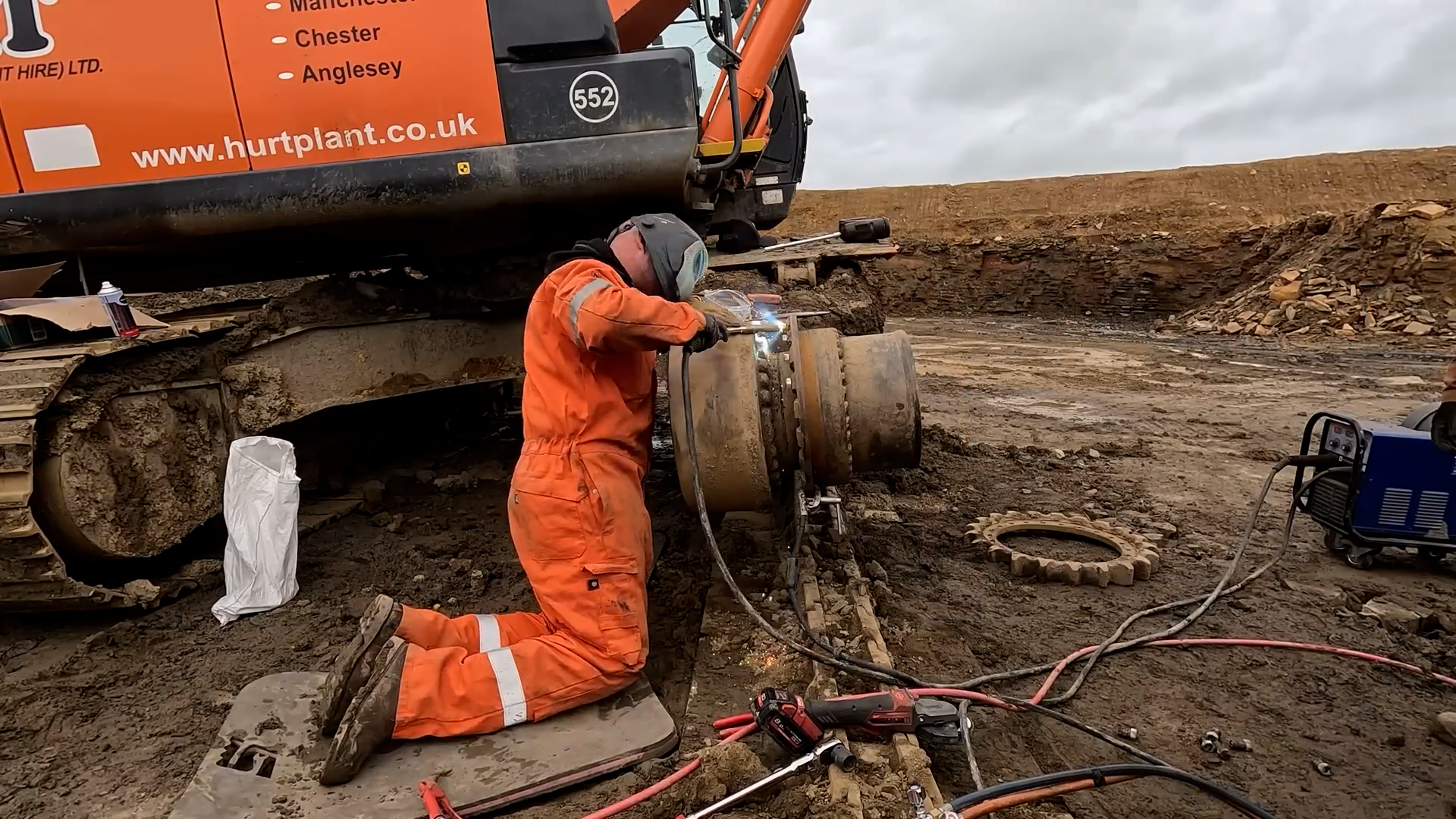 Onsite excavator repair work