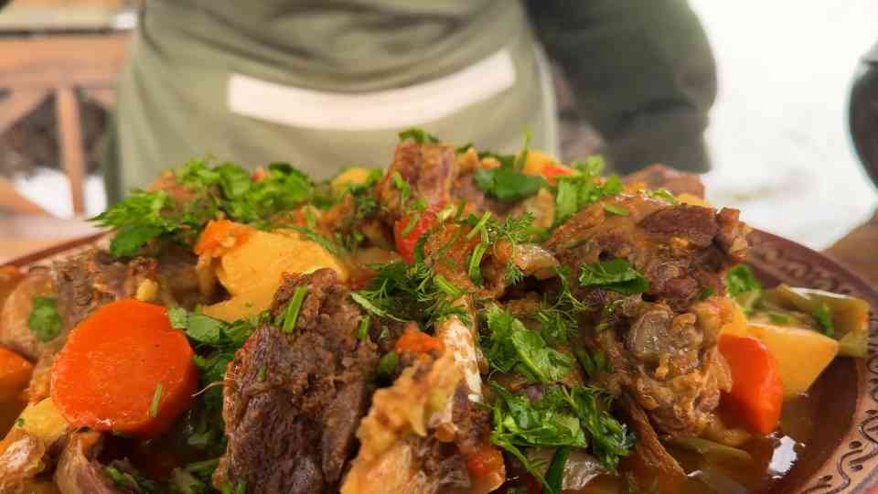 Fat goose stewed in an Afghan cauldron!