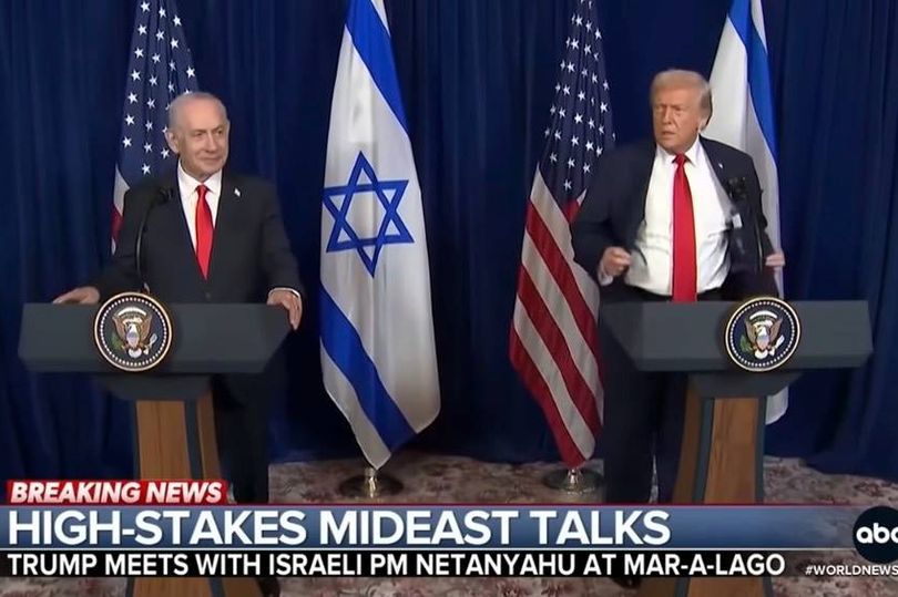 Trump warns Iran US 'locked and loaded' as at least seven killed in ...