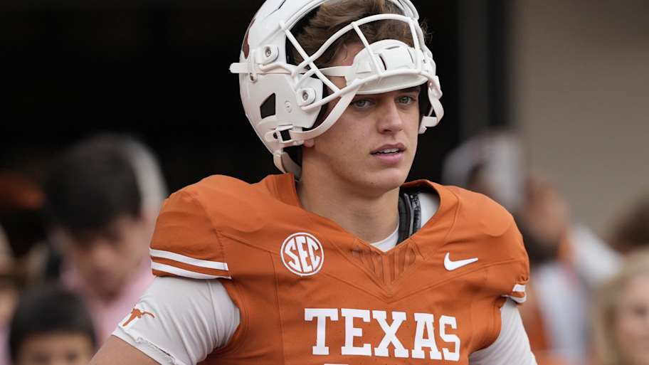 Texas QB Arch Manning dispels Alabama rumors hanging with Michigan QB