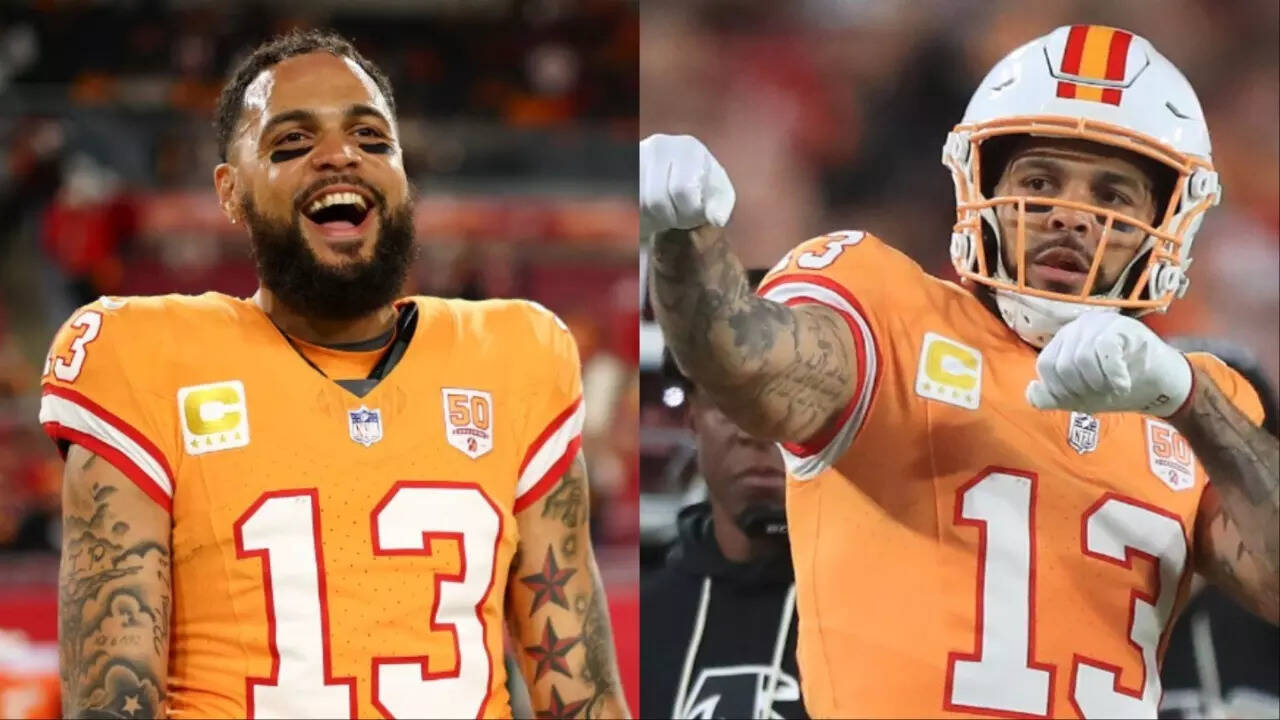 Tampa Bay Buccaneers WR Mike Evans hands his gloves to a young fan ...