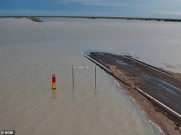 One person dies in north Queensland floods - as Cyclone Hayley makes ...