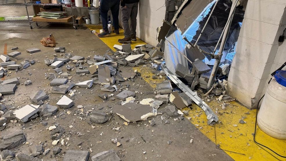 Driver hospitalized after car crashes into building off Amnicola ...