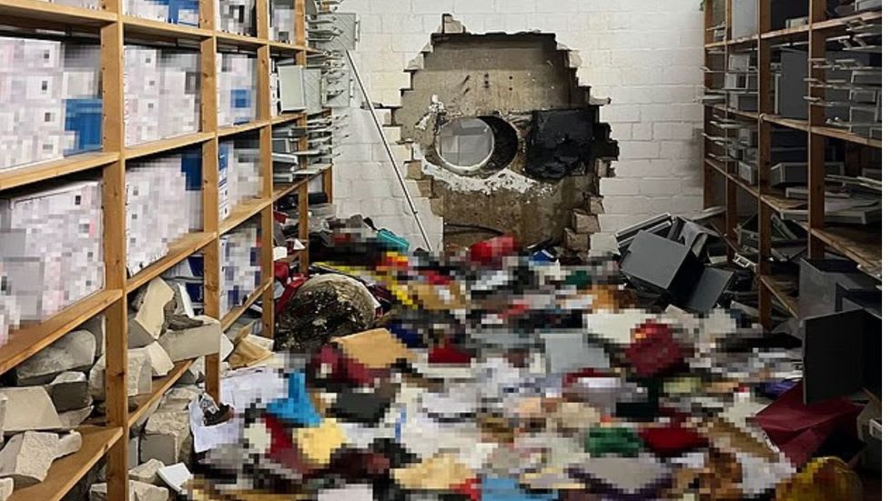Robbers steal £26million worth of cash and jewellery from bank by ...