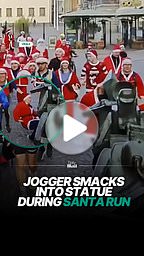 Clumsy jogger smacks into statue during Santa run