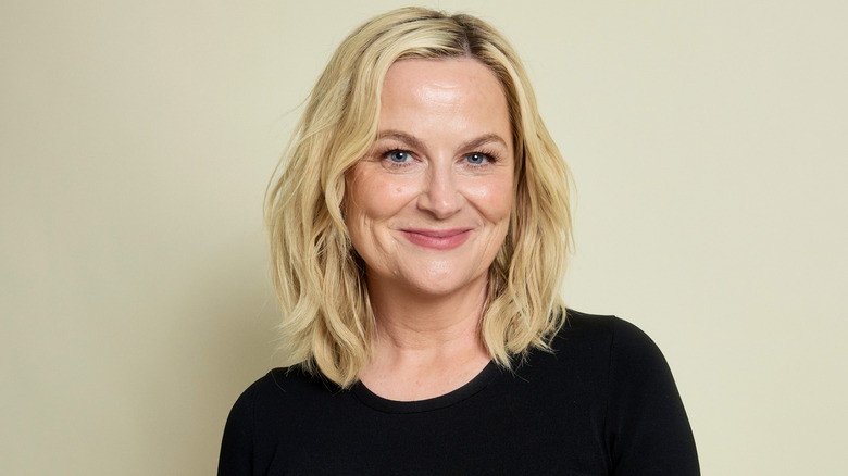 Amy Poehler spilled the restaurant secret to popping champagne without ...