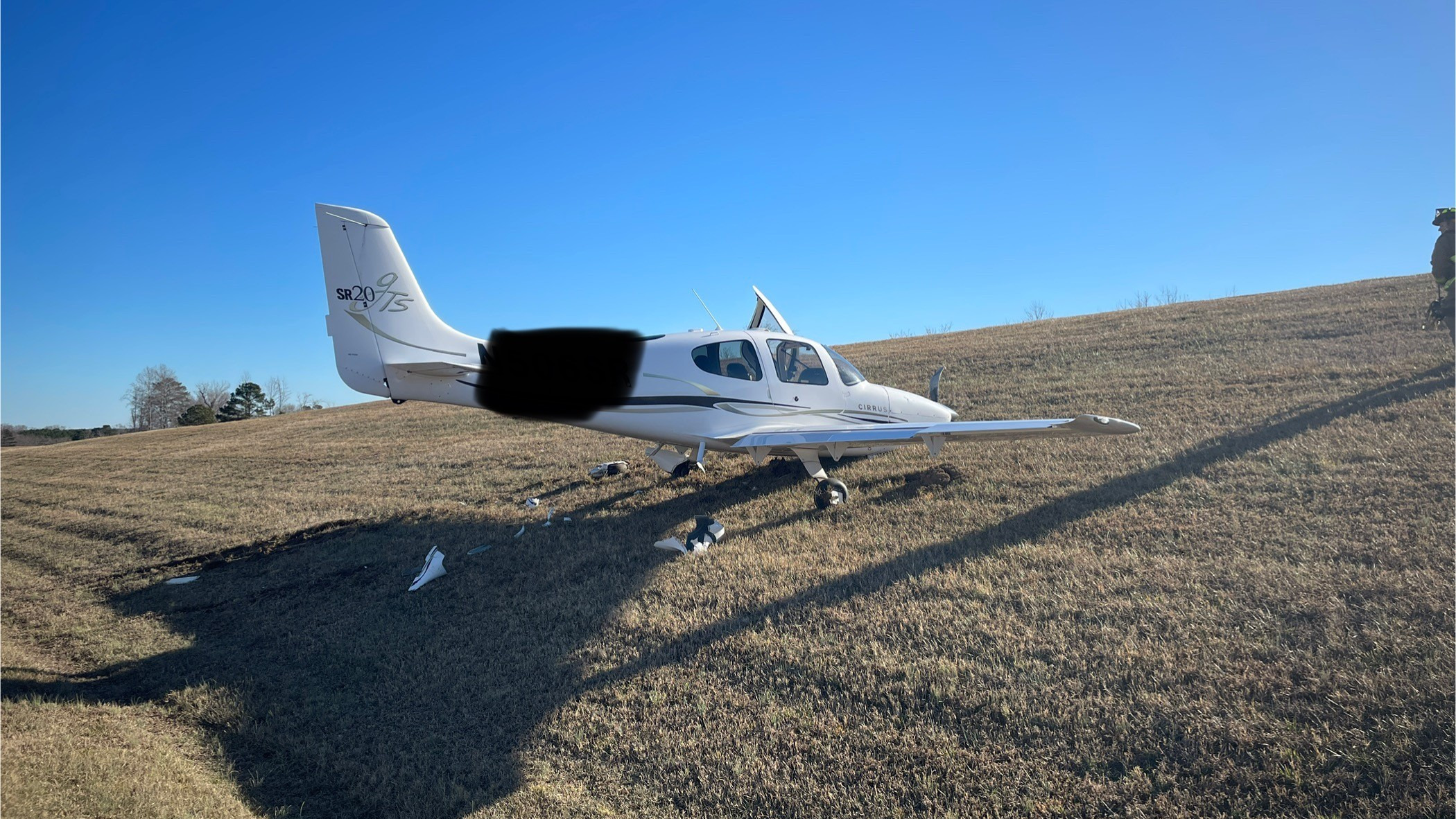 Small plane blown off runway while pilot conducting touch-and-go ...