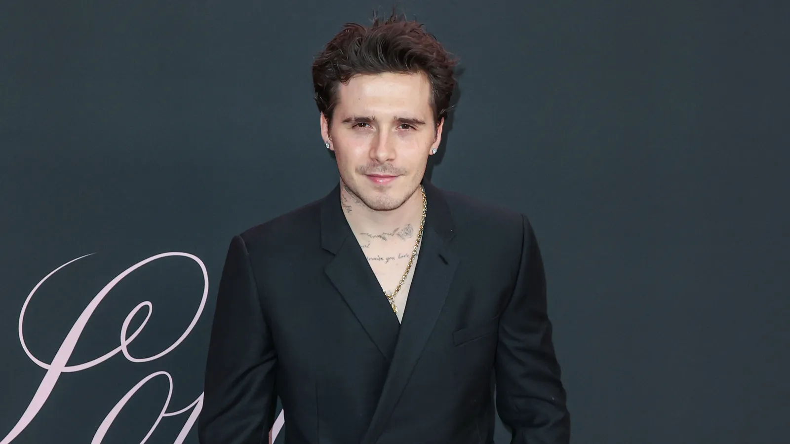 Brooklyn and Nicola’s awkward red carpet moment with Victoria Beckham