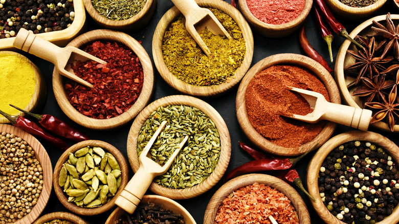 This Dollar Tree DIY turns travel jars into a space-saving spice rack