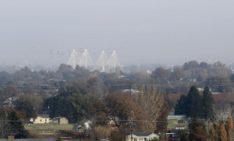 Air over Tri-Cities stagnates. Beware of patches of freezing fog