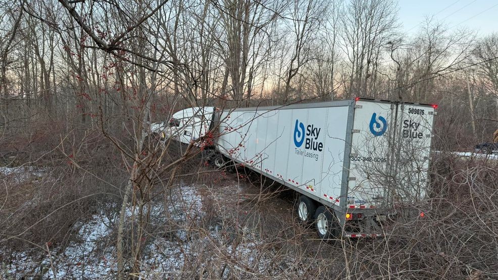 Tractor-trailer truck crashes into woods in Killingly