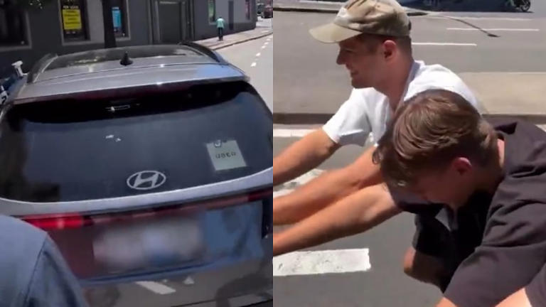 Video: Perth Scorchers players push broken Uber SUV while on way to ...