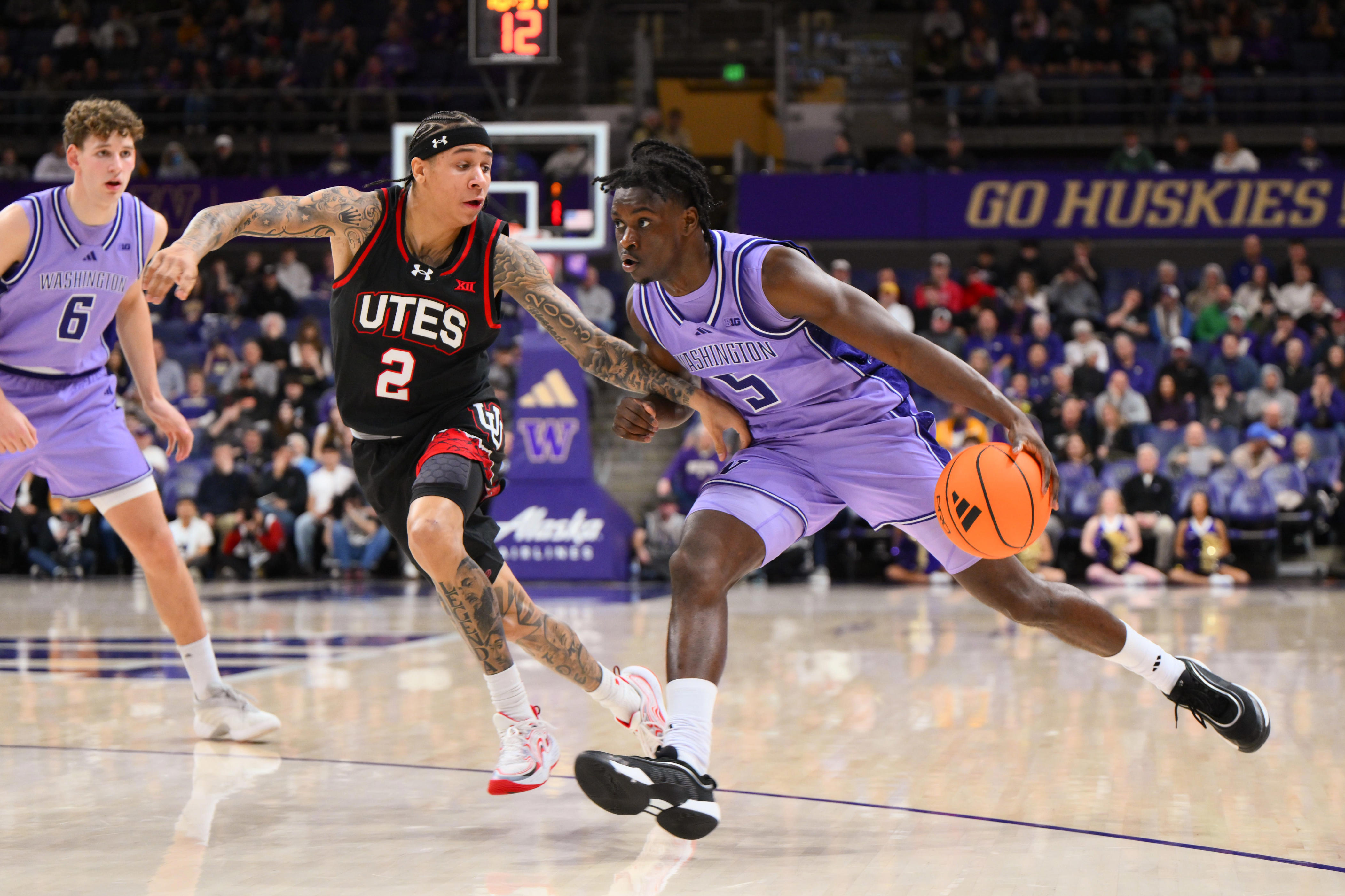 Zoom Diallo stars in Washington basketball's 74-65 win over Utah