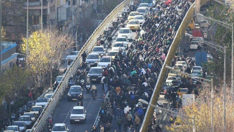 Mass protests erupt in Tehran as Iran faces economic crisis & currency ...