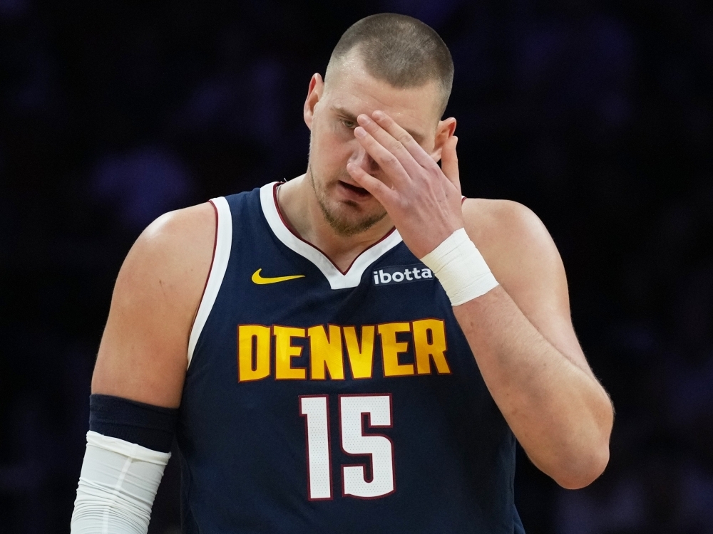 Denver Nuggets' Nikola Jokic suffers 'gut-wrenching' knee injury