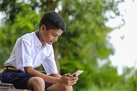 Taking phones away is easy, teaching kids to read the world isn't