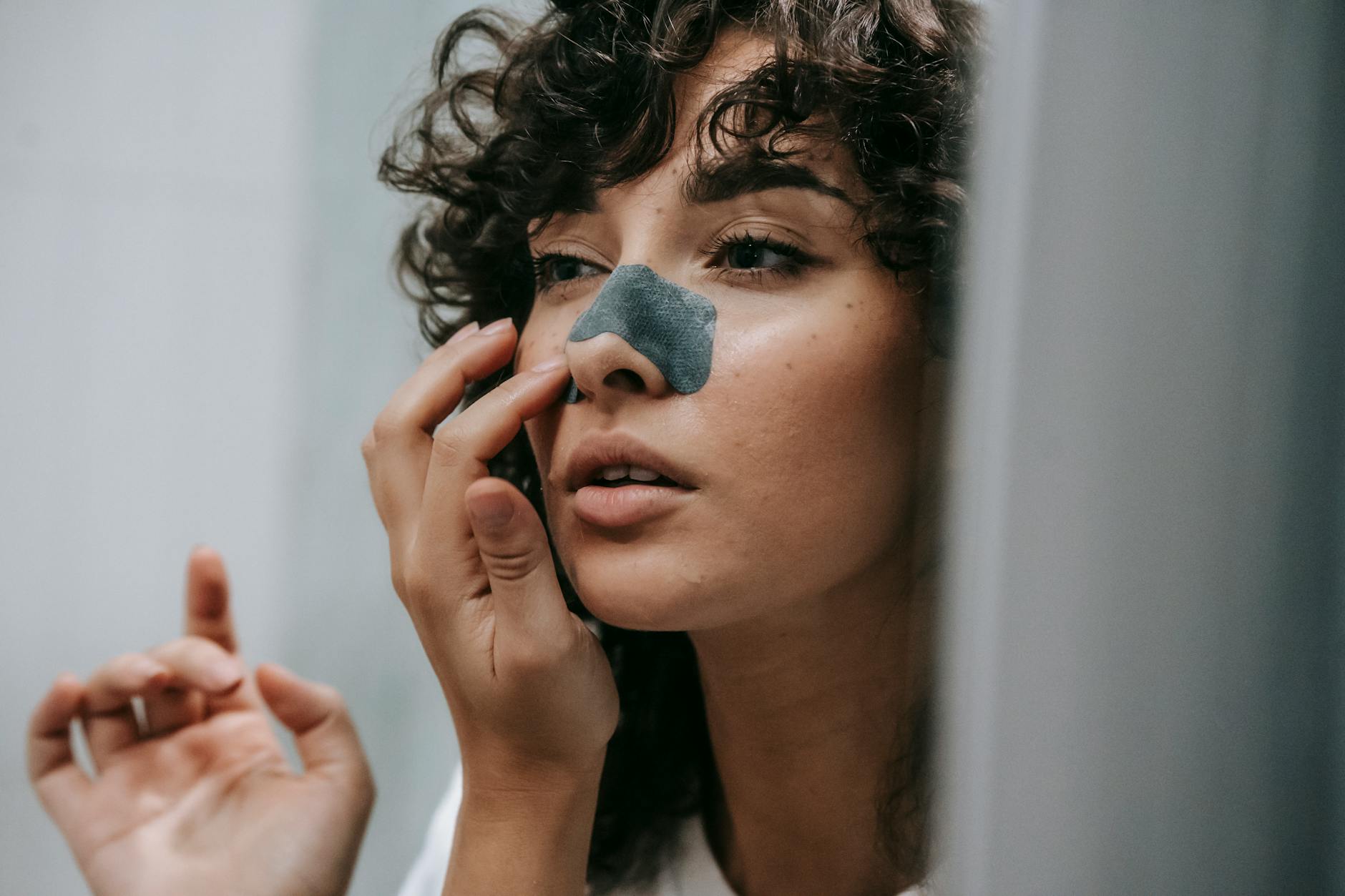Why your nose gets black dots (and the evidence-based fixes that work)