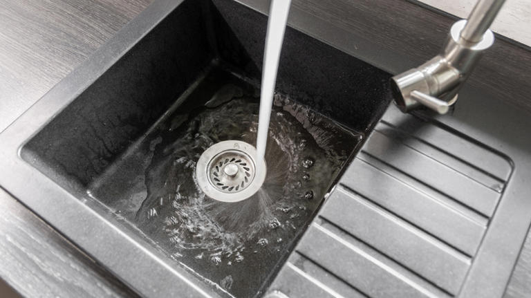 How to remove stubborn stains from a dark composite sink