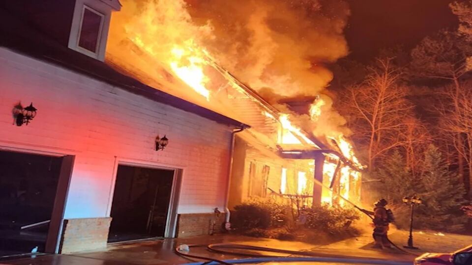 NASCAR driver's father dies after house fire