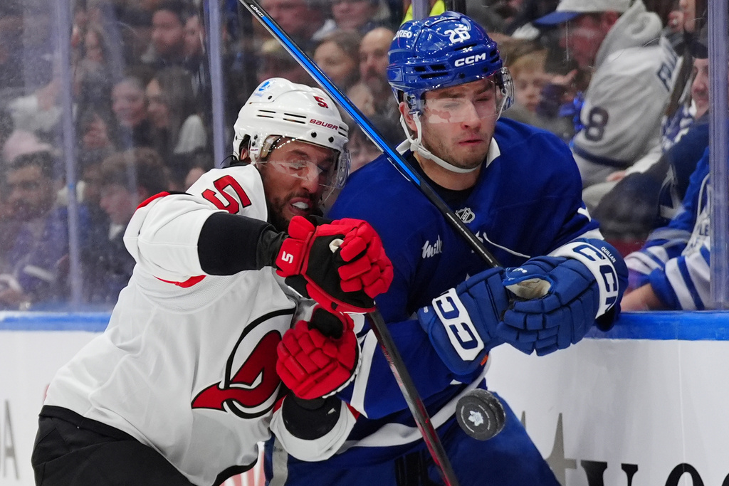 Woll earns 1st shutout of the season as Maple Leafs send Devils to ...