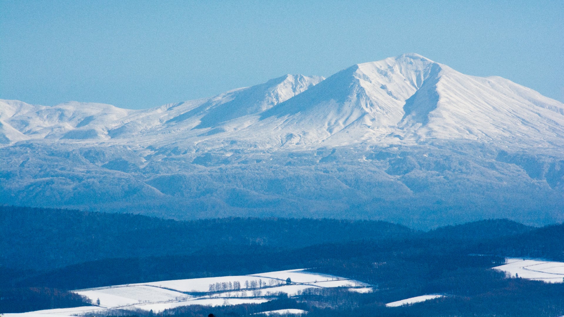 In Japan, this island of snow-covered volcanoes has some of the most ...