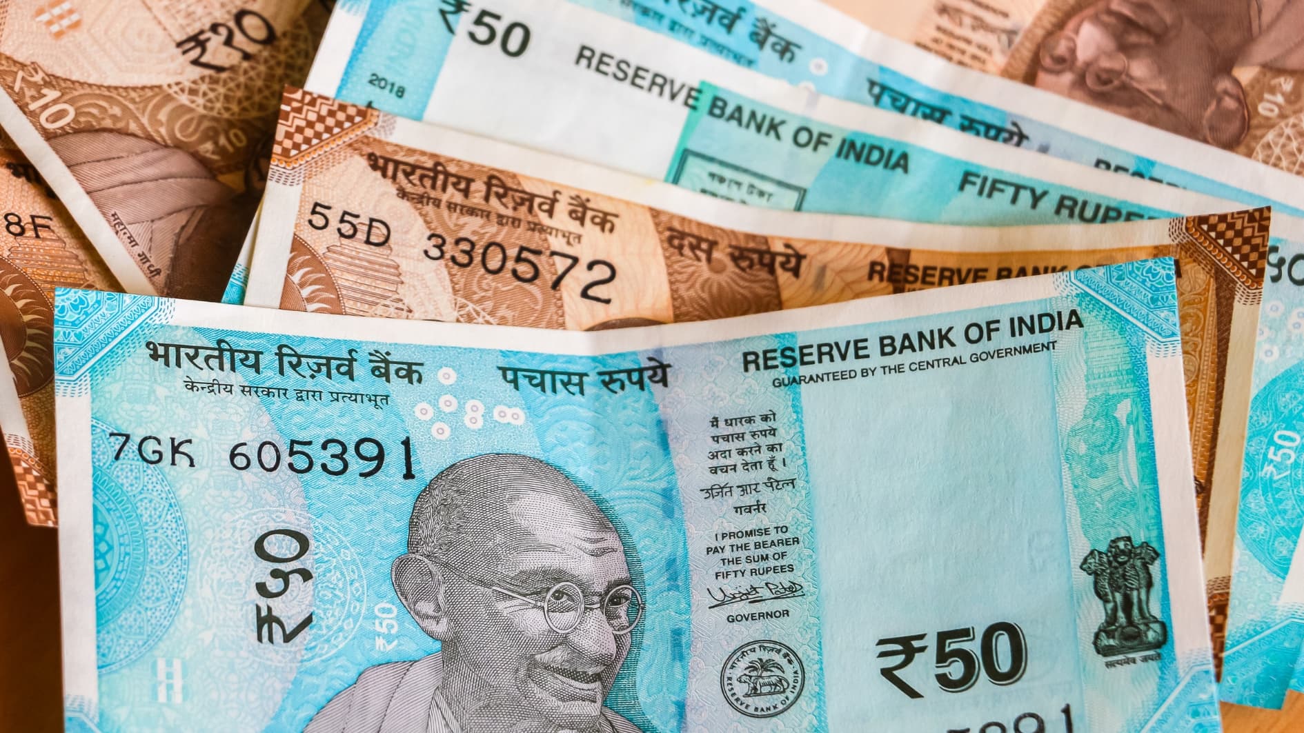 Rupee’s slide explained: Tariffs, FII flight and a trade deal stuck in ...