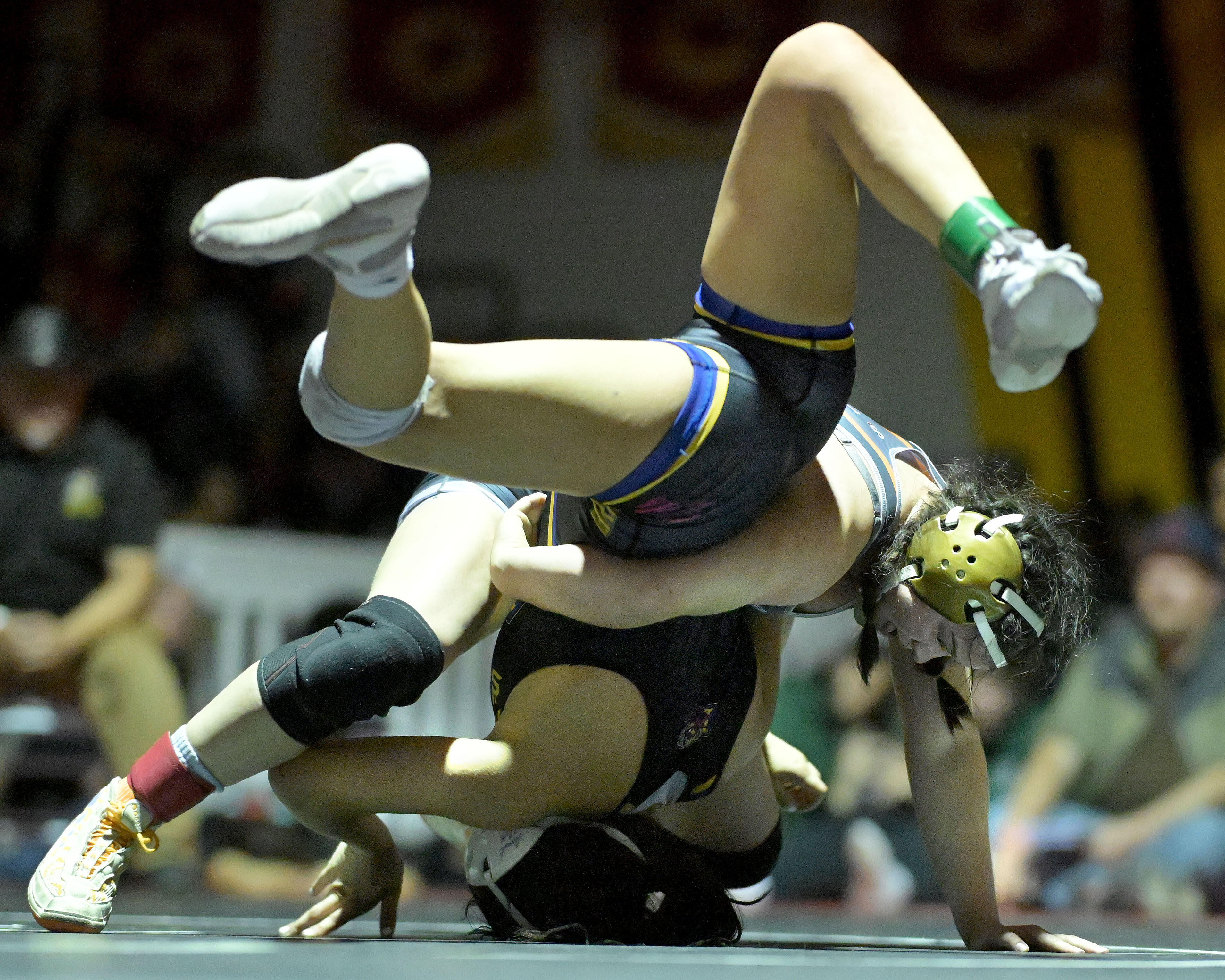 Six Inland girls wrestlers claim titles at Queen of the Hill invitational