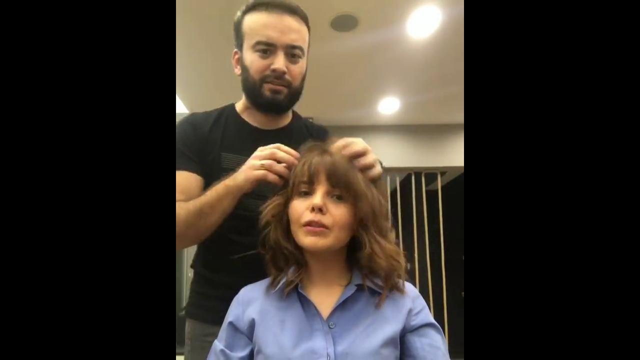 Showing black hair with brown coloring and styling