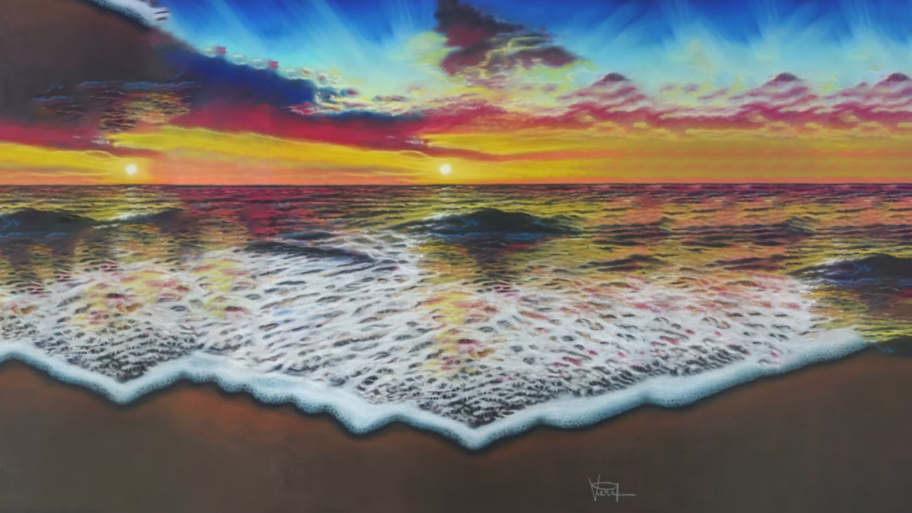 Peaceful sunrise on the beach with golden morning light