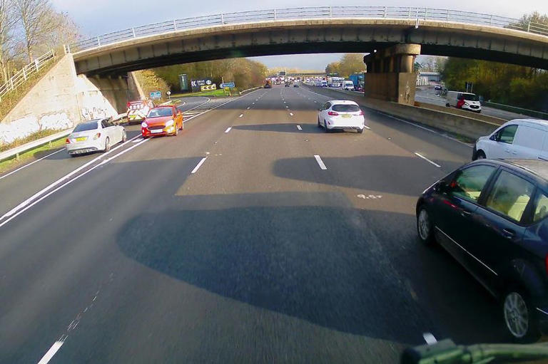 Heart-stopping moment 'old woman drives wrong way down M6' caught on camera