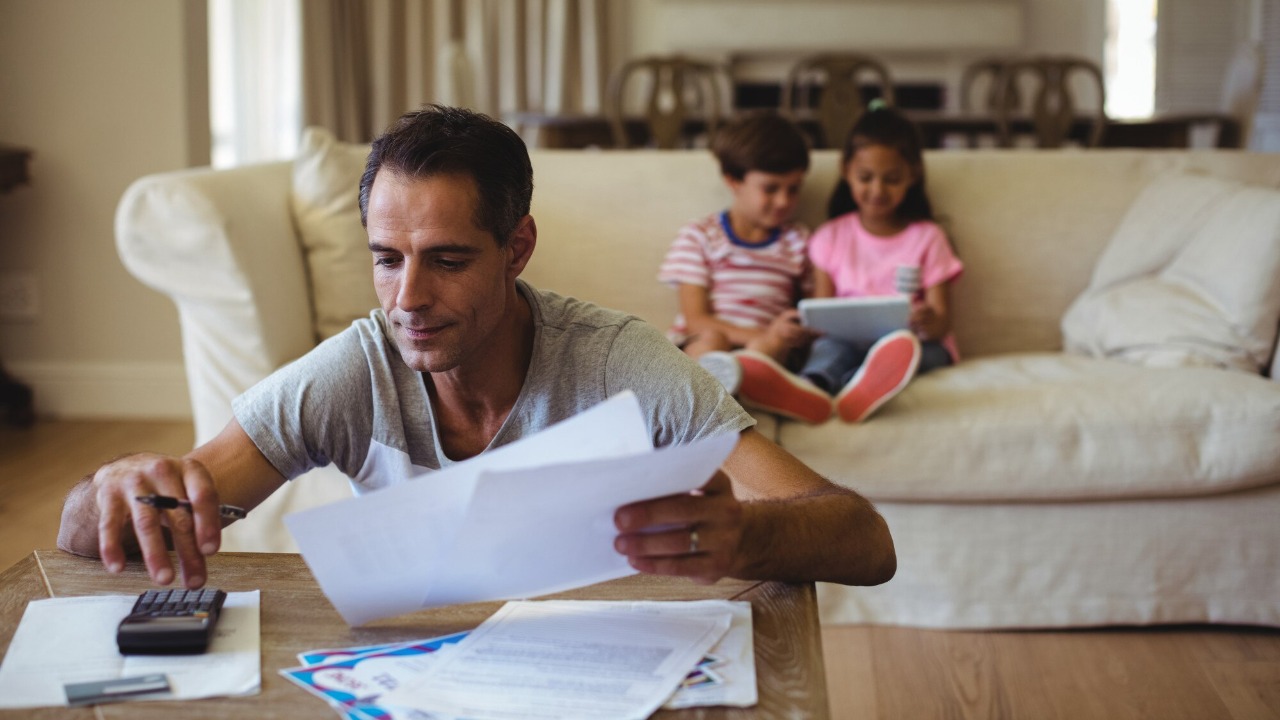 Americans are 'muscling through' soaring costs, analyst explains