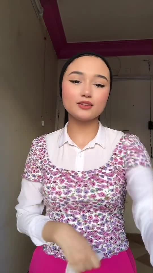 Styling a bright floral Shein outfit for a modest hijabi look