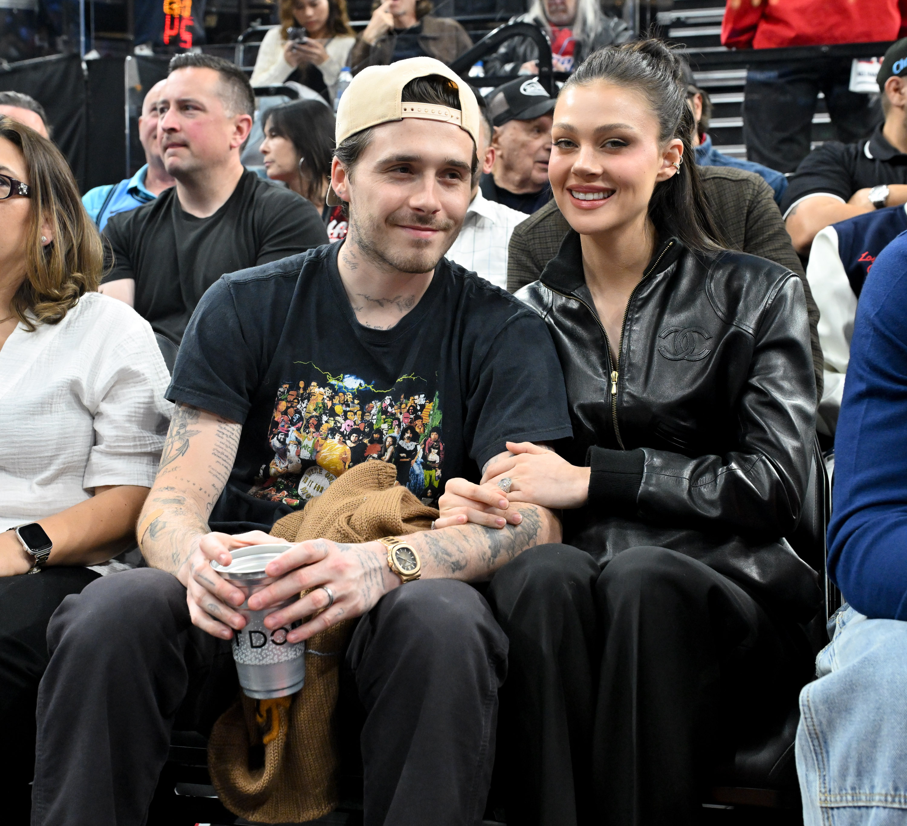 Nicola Peltz and Brooklyn Beckham end 2025 with cozy twinning moment ...
