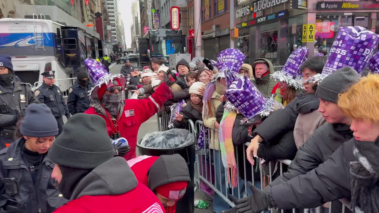 Times Square revelers receive party hats in viewing areas ahead of ball ...