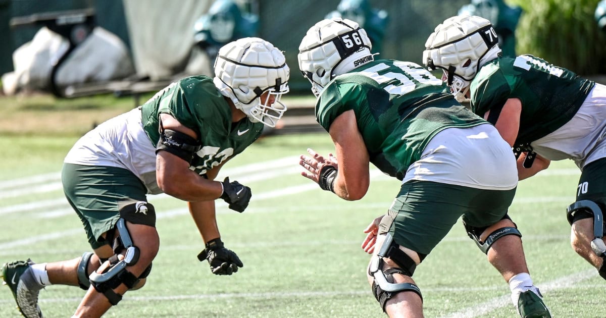 Often injured Michigan State offensive lineman Cole Dellinger head to ...