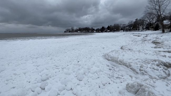 Snow and ice cover Lake Erie shoreline after winter storm